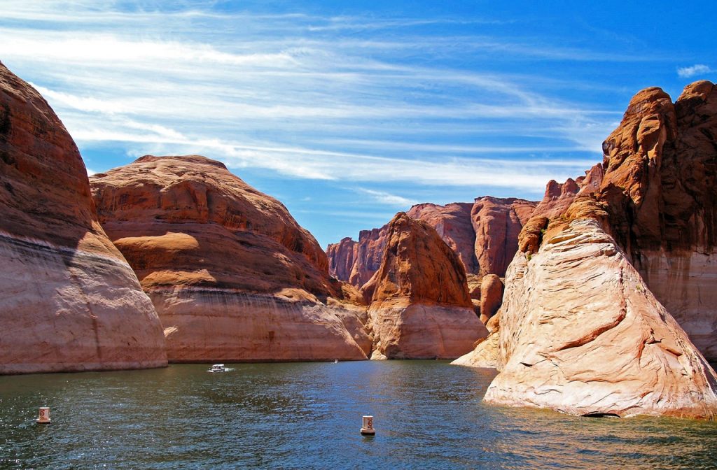 Sail To The Majestic Rainbow Bridge At Lake Powell | TouristSecrets