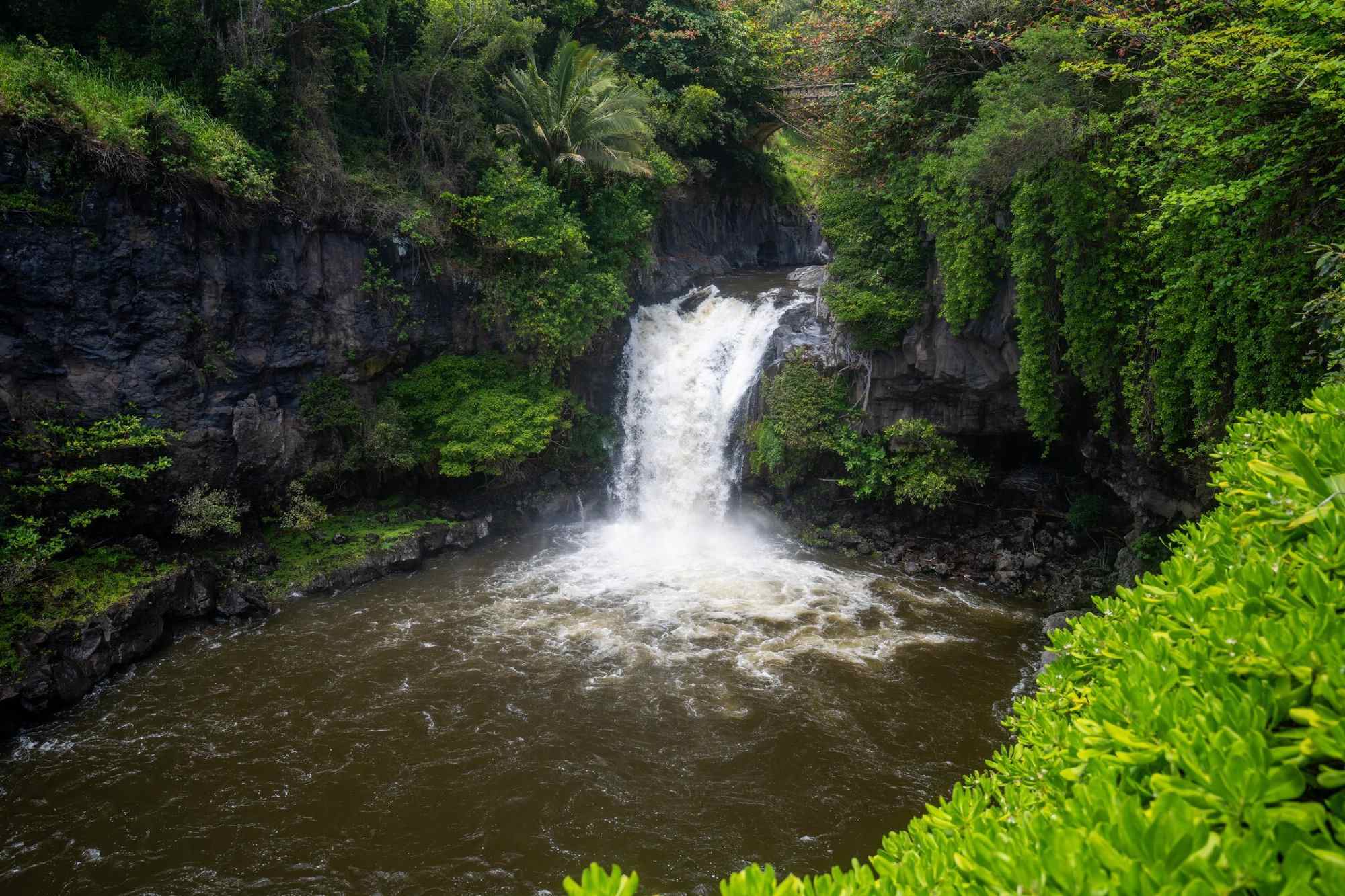 Sacred Waters Of Hawaii's Nanue Falls | TouristSecrets